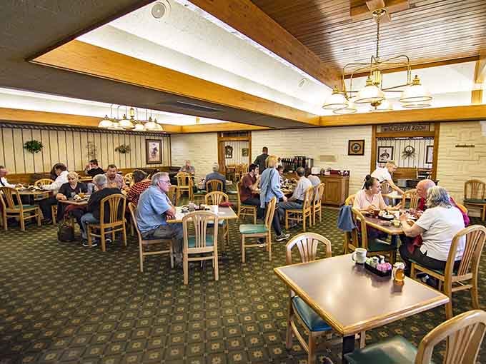 Simple wooden chairs and tables create the perfect setting for serious eating and even more serious conversation about dessert.