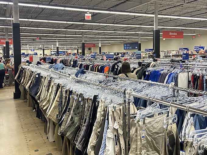 Rows of clothing stretch endlessly like a fabric maze where getting lost is half the fun and finding deals is the reward.