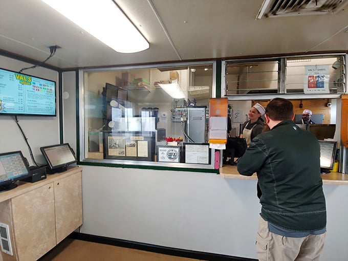 Through that order window, magic happens on a flat-top grill while hungry folks wait with anticipation.