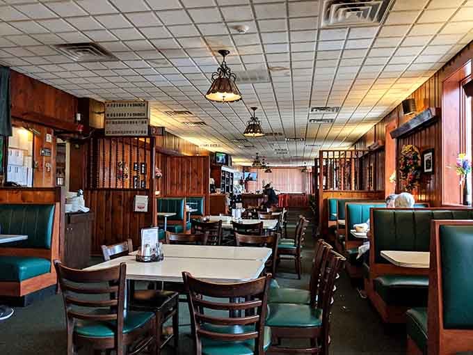 Wood paneling and teal booths create the perfect time capsule of Italian-American dining done right.