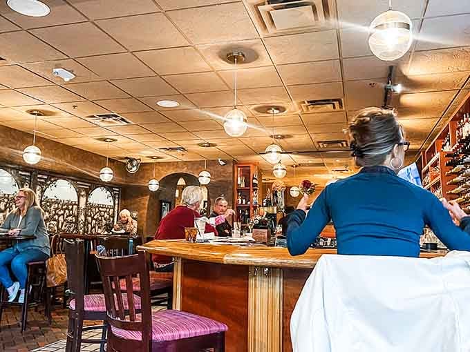 Cozy seating and warm lighting create the perfect setting for serious pasta consumption and laughter.