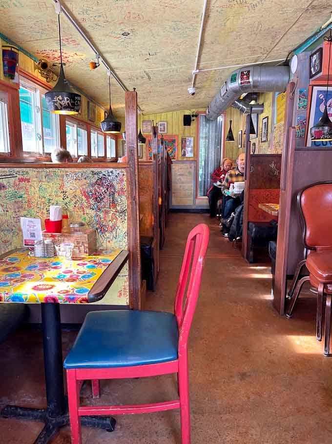 Every surface tells a story in this cozy time capsule where strangers become part of the permanent decor.