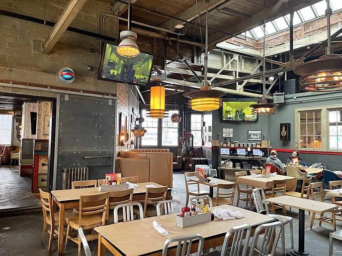 High ceilings, exposed beams, and vintage charm create the perfect backdrop for serious burger contemplation.