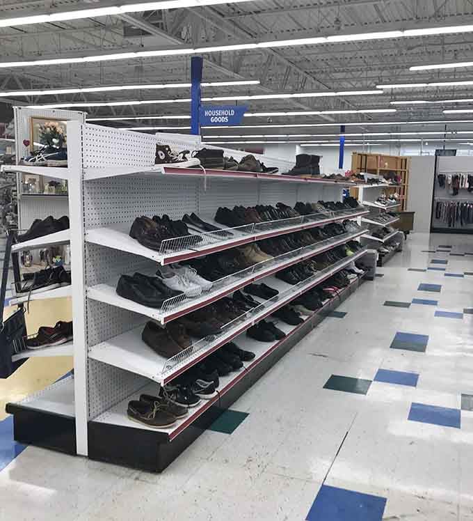Shoes organized by actual shelving instead of chaos? This isn't your typical thrift store treasure hunt anymore.