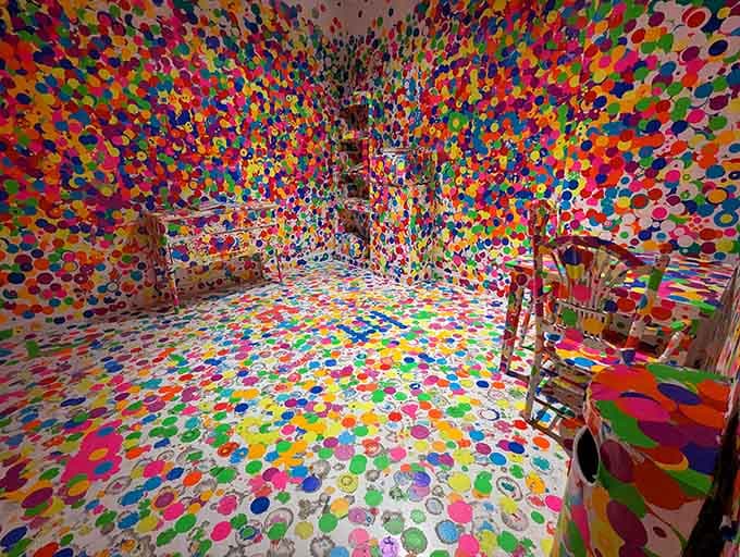 Every surface screams with joy in this kaleidoscope room where restraint took a permanent vacation and never looked back.