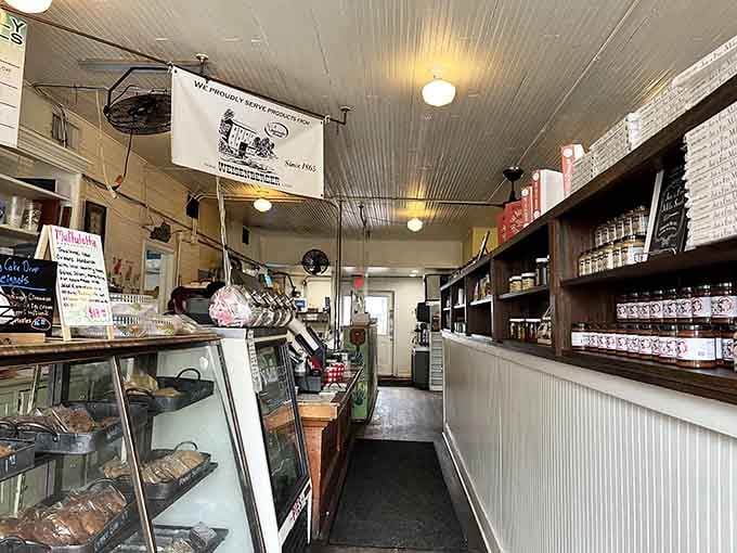 Step inside this charming country store where pressed tin ceilings meet fresh-baked bread and culinary magic happens daily.