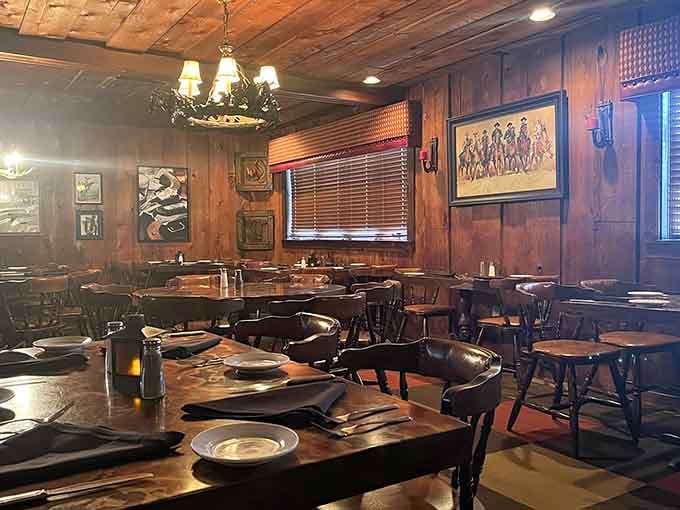 Wood paneling and Western art create the perfect backdrop for your upcoming carnivorous adventure.
