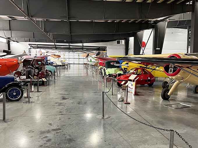 Where vintage aircraft and classic automobiles share space like old friends at a reunion.