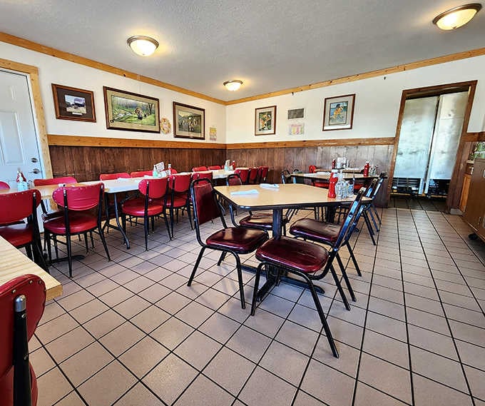 Step inside where wood paneling and local artwork create that timeless small-town diner atmosphere everyone craves.
