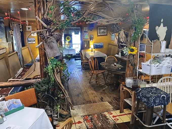 Dining under an indoor canopy where fairy lights twinkle like fireflies caught mid-dance through the branches above.