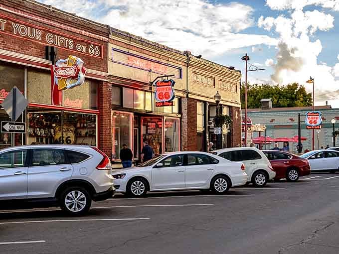 Brick storefronts and classic Route 66 signage line the streets, creating a Main Street USA vibe that Walt Disney himself would've tipped his hat to.