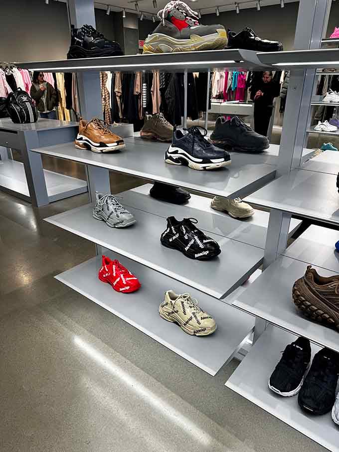 Sneaker displays that would make any footwear enthusiast weak in the knees, organized with museum-quality precision and outlet prices.