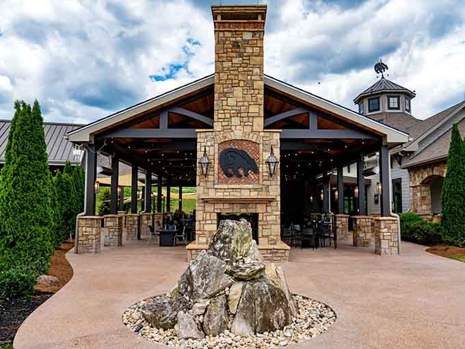 This covered pavilion with its stone fireplace is where rustic elegance meets "I could stay here all day."