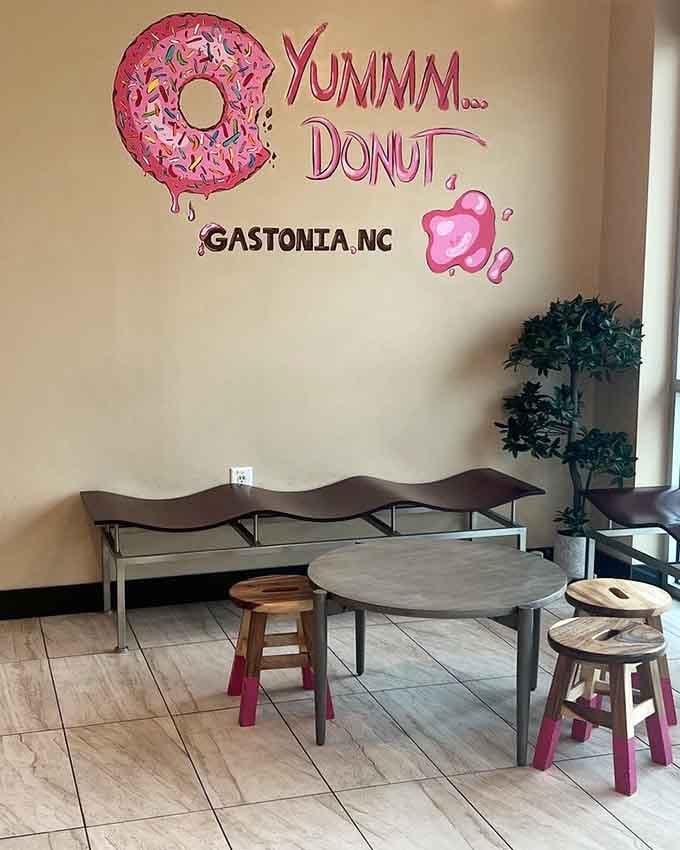 Step inside where colorful stools and cheerful wall art remind you that life's too short for boring breakfast spots.