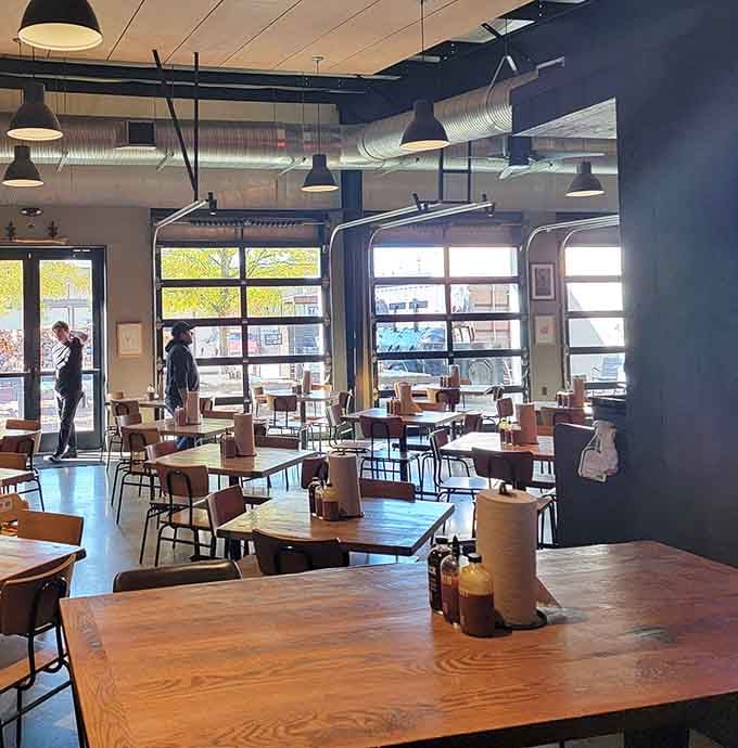 Industrial chic meets barbecue comfort in a space that says "relax, you're about to eat really well."