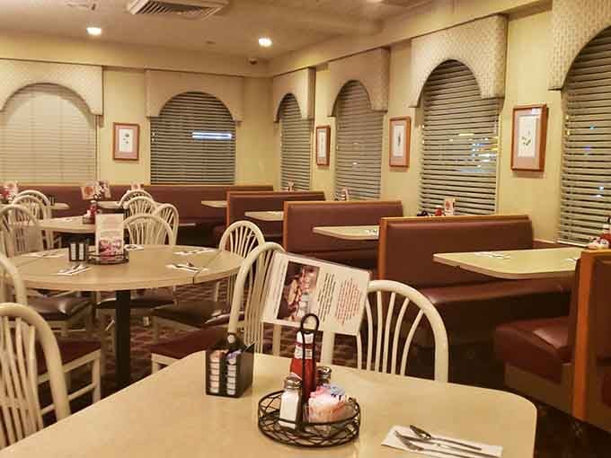 Classic diner booths meet Mediterranean arches in a space that feels both familiar and refreshingly different.