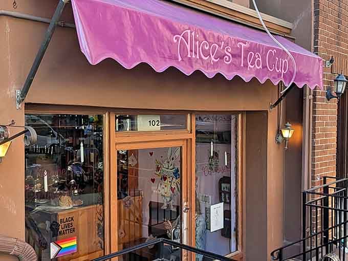 That purple awning practically glows with whimsy, promising tea parties that would make the Mad Hatter jealous beyond reason.