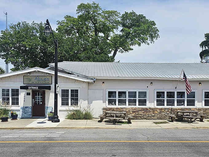 Clean white walls and stone accents make this spot look like it belongs in a coastal design magazine.