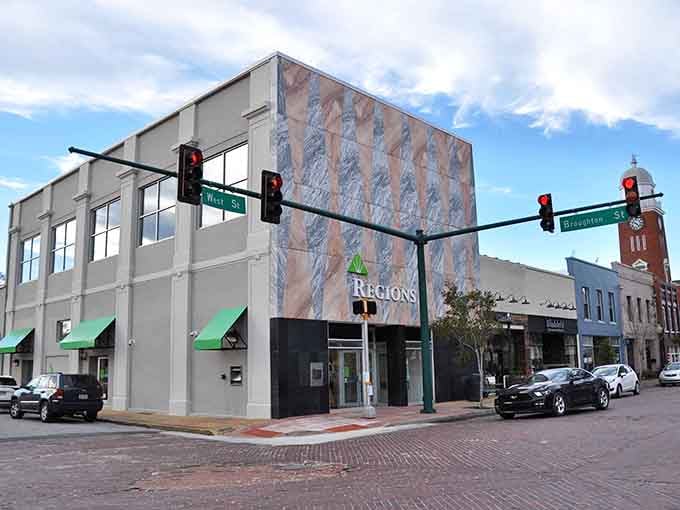 Brick streets and green awnings create a downtown that feels like stepping into a friendlier, slower-paced America.