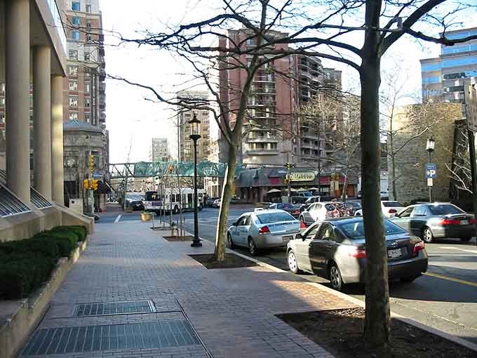 Tree-lined streets frame urban sophistication where walkability meets culture and every corner promises something worth discovering together.