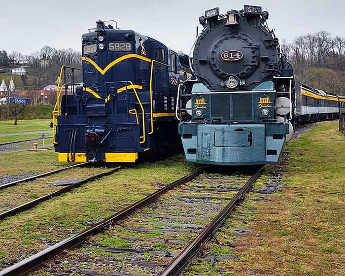 Two generations of railroad power standing side by side, like comparing your dad's station wagon to grandpa's Model T.