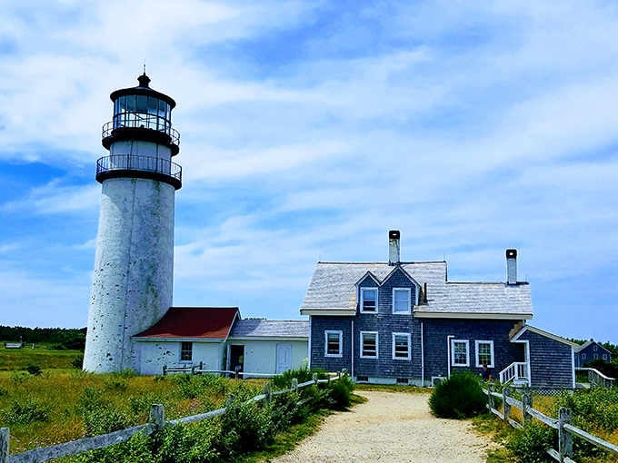Standing tall against coastal winds, this weathered lighthouse and keeper's house tell stories of countless storms and starry nights.
