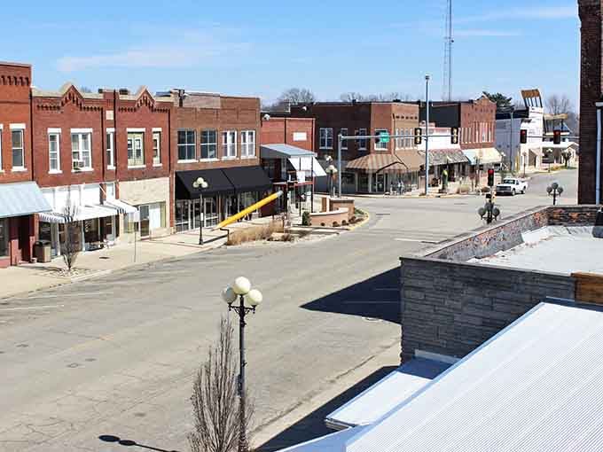 Main Street looks like it stepped right out of a Norman Rockwell painting, brick buildings standing proud under blue skies.