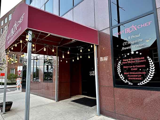 Those string lights dangling under the awning create an inviting glow that says "come on in, friend."