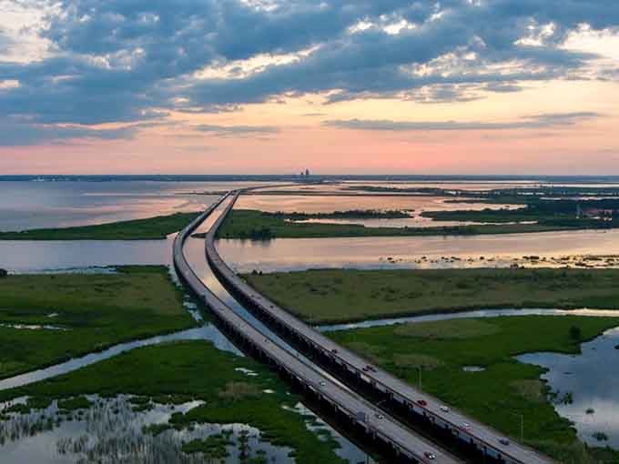 Driving over water never looked so peaceful—this coastal ribbon stretches toward horizons that seem endless and inviting.