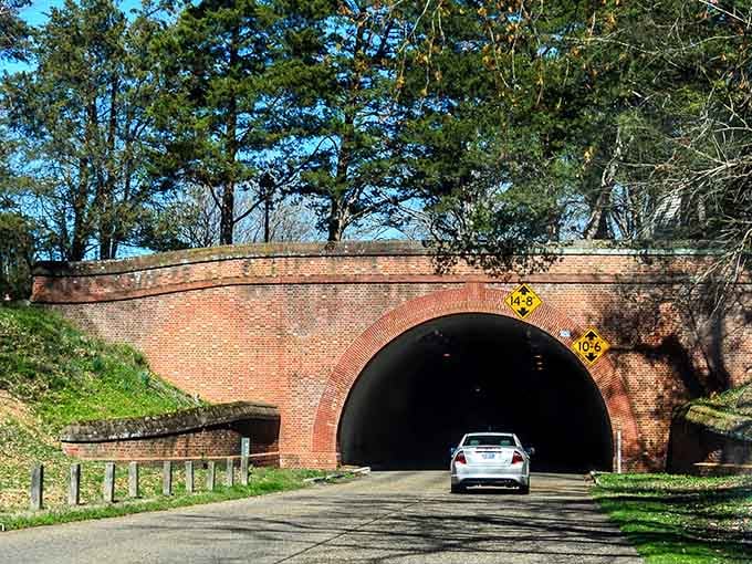 Driving through this brick tunnel feels like entering Narnia, except instead of a wardrobe, you've got a sedan.