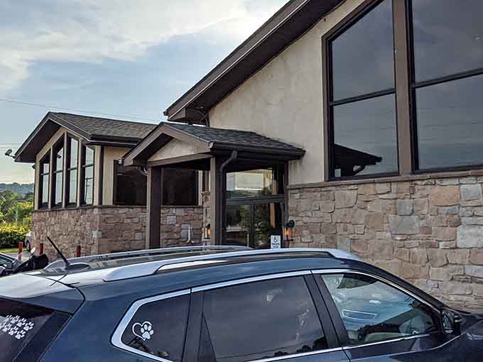 Stone and glass architecture that says "we're serious about steak" without being stuffy about it at all.