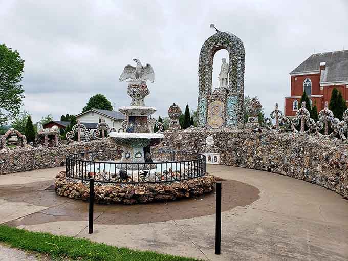 This fountain centerpiece sparkles with thousands of stones and shells creating a folk art masterpiece worth discovering.