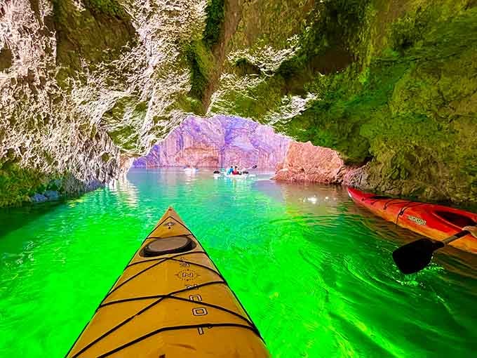 Paddling into this glowing emerald cave feels like discovering your own secret underwater treasure room.