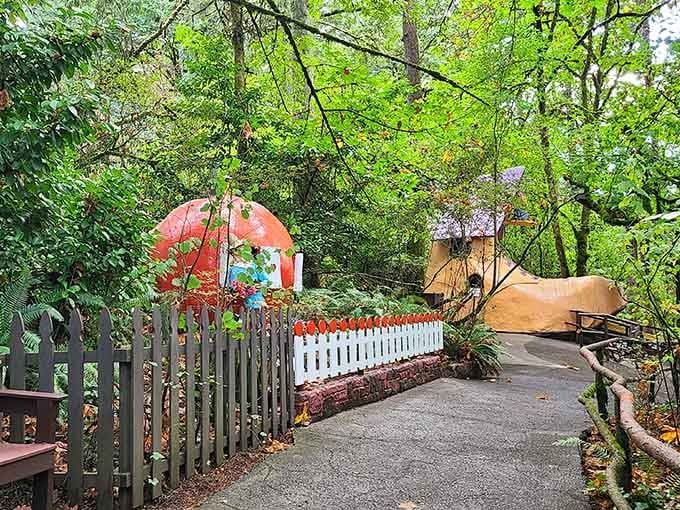 That oversized toadstool isn't from your gardening catalog&mdash;it's pure imagination sprouting among the towering evergreens here.