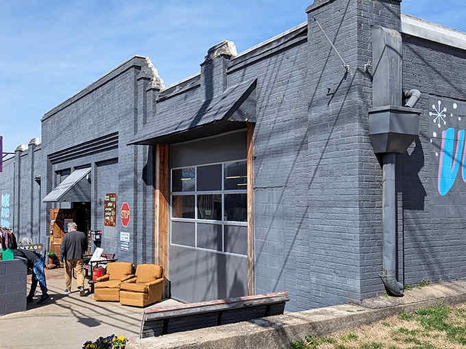 That charming gray facade hides a vintage wonderland where yesterday's coolest finds wait for their next adventure.