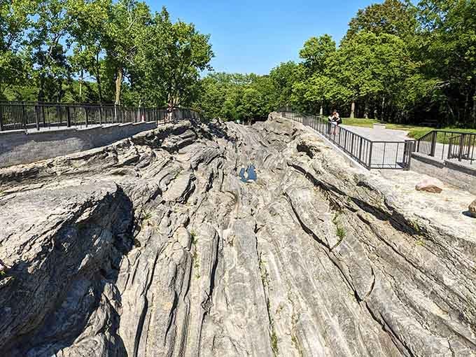 When a glacier drags rocks across limestone for thousands of years, it leaves grooves deep enough to walk through.