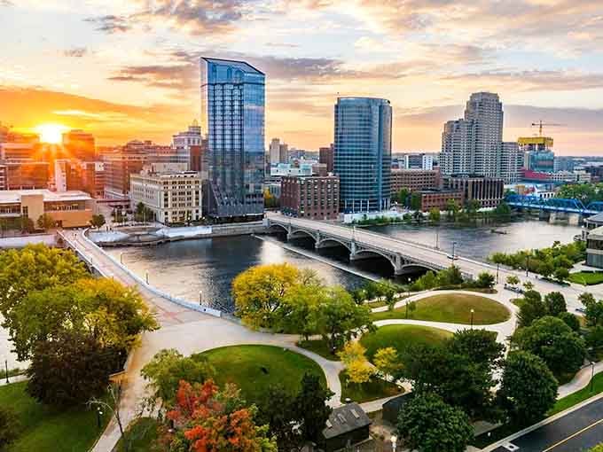 Golden hour turns Grand Rapids into a postcard, where the river reflects glass towers and green parks in perfect harmony.