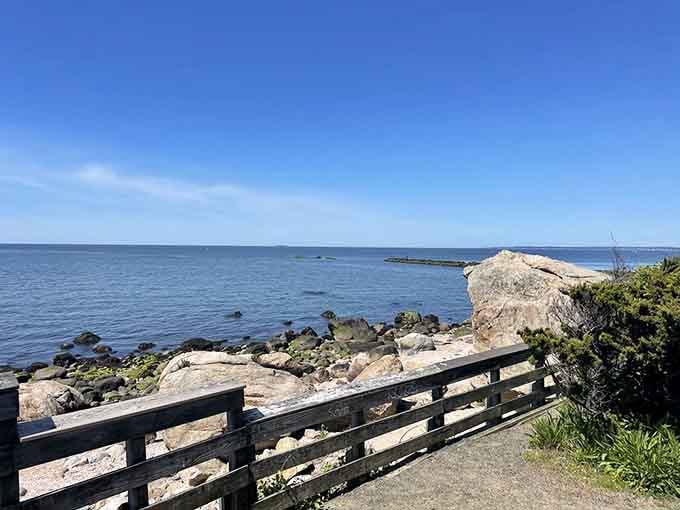 Rocky shores meet endless blue horizons where Long Island Sound whispers its timeless coastal stories to patient listeners.