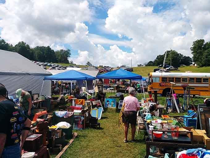 That old school bus parked alongside the vendors adds authentic charm to this sprawling outdoor marketplace.