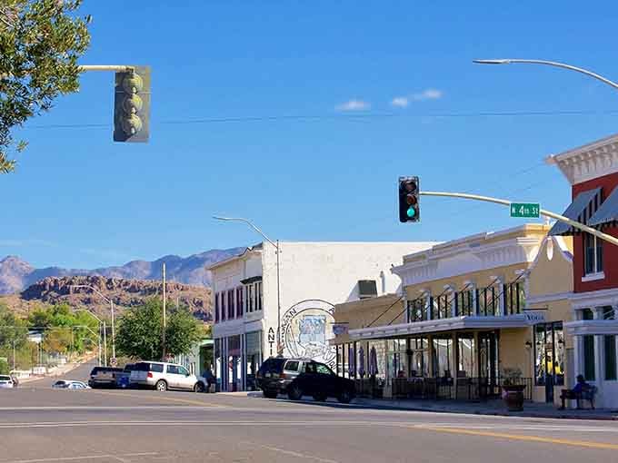 Kingman's main street stretches wide under endless blue skies, where mountains frame every view like nature's own postcard.