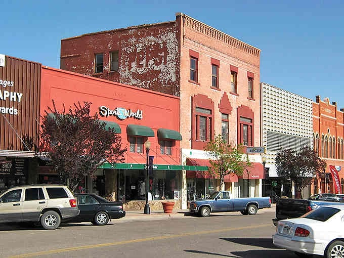 Ghost signs fade on weathered walls in La Junta, where history whispers and your Social Security check actually matters.