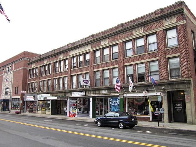 Classic storefronts line Leominster's Main Street, where local shops still thrive beneath charming vintage facades.