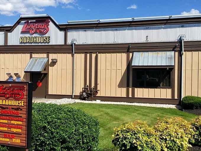 The classic roadhouse exterior with its metal siding practically whispers "comfort food" in that universal restaurant language.