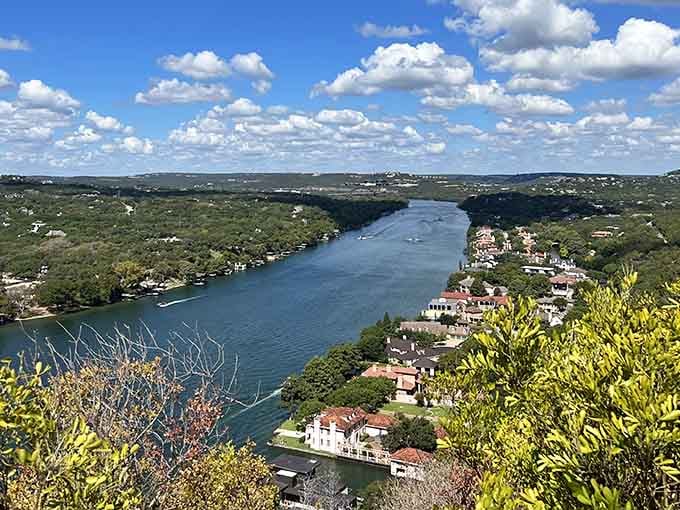 The Colorado River winds through Austin's hills like a blue ribbon, rewarding your climb with million-dollar views for free.