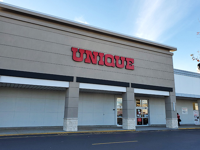 Bold red letters announce this spot where unique finds wait behind those modern gray walls and welcoming entrance doors.