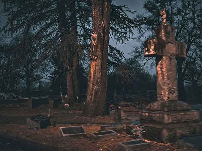 When twilight settles over these old graves, the shadows grow longer and the silence becomes almost too loud.