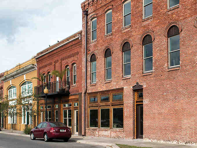 These historic brick buildings have stood watch over downtown for generations, weathering storms and celebrating sunny days.