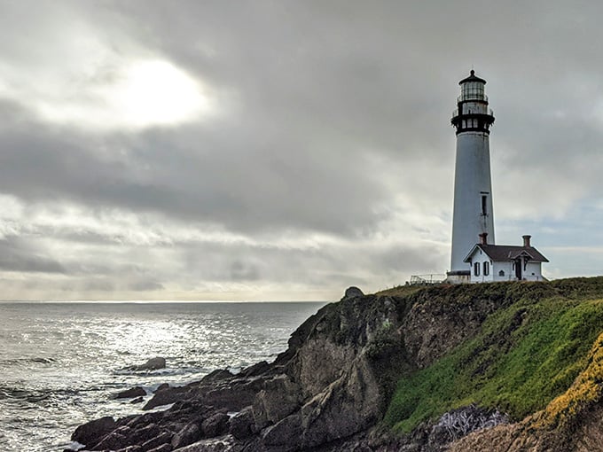 Standing tall like a white sentinel, this elegant tower watches over the coastline with timeless grace and purpose.