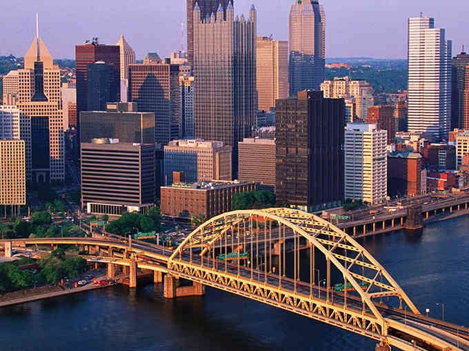 Pittsburgh's golden bridges gleam at sunset, proving this steel town polished up real nice over the years.