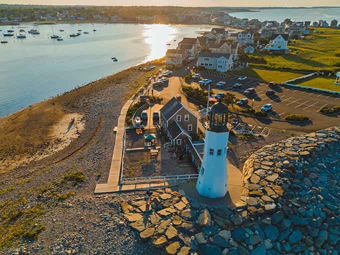 The aerial view reveals Scituate's charming keeper's house nestled beside its faithful tower, a perfect coastal pairing.